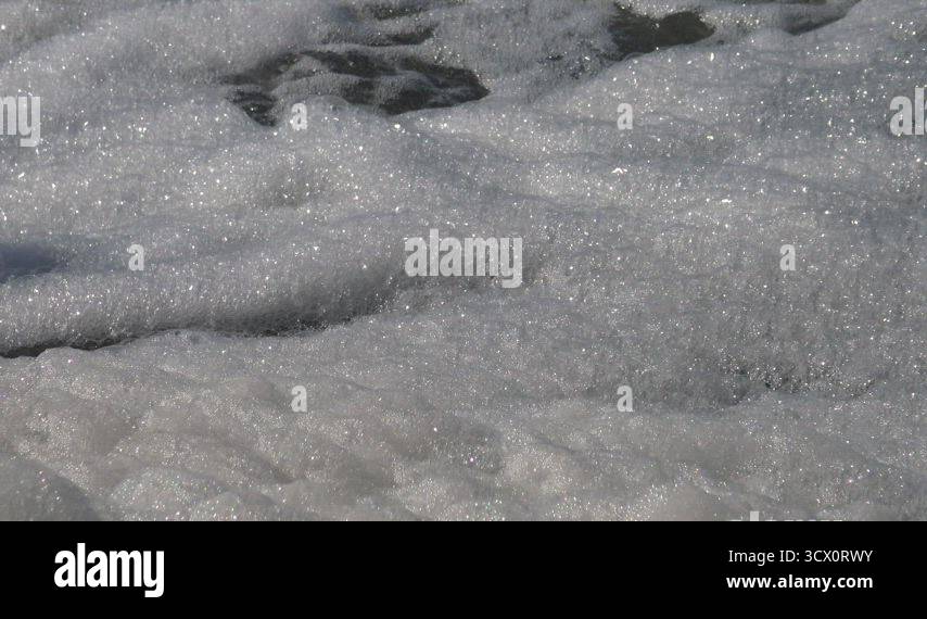 Water pollution. Dirty water from treatment plants flows through a pipe ...