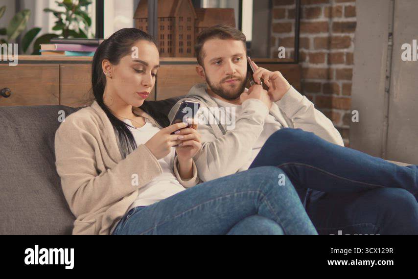 Lazy couple sitting on couch Stock Videos & Footage - HD and 4K Video ...
