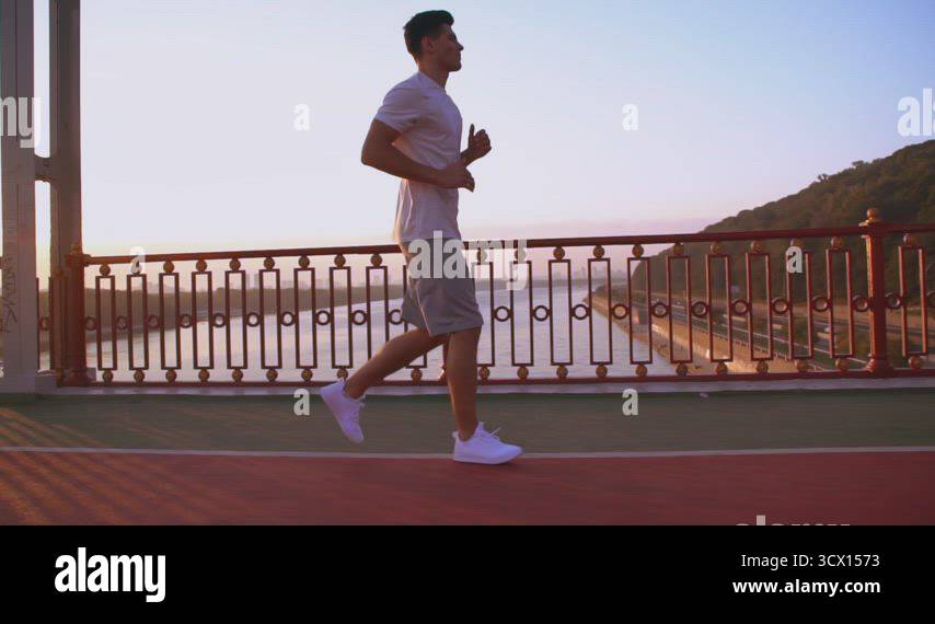 man is running in the morning Stock Video Footage - Alamy