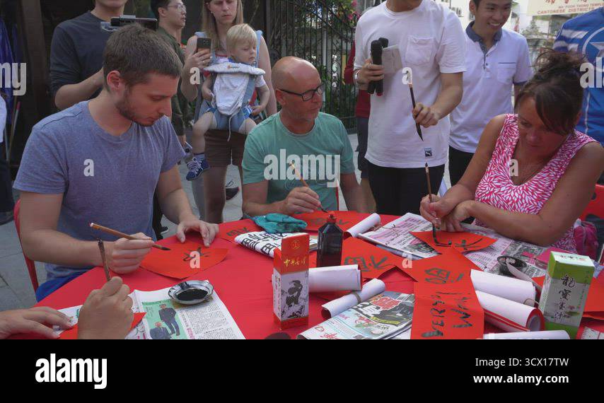 Foreign learn write chinese calligraphy Stock Video Footage - Alamy