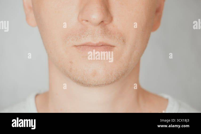 close up face guy eating doughnut Stock Video Footage - Alamy