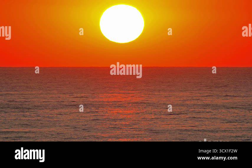 big sun down over sea, red sky slow motion 4k Stock Video Footage - Alamy