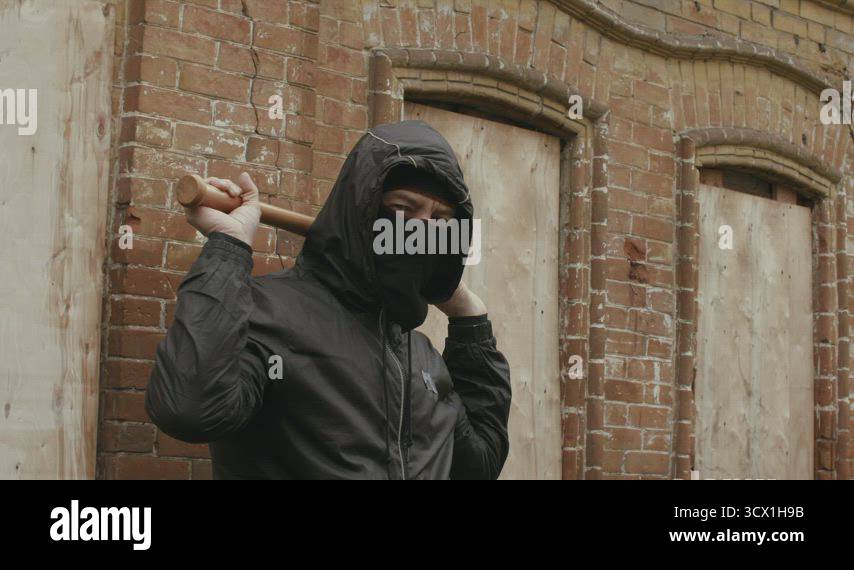Aggressive hooligan in mask hood Stock Videos & Footage - HD and 4K ...
