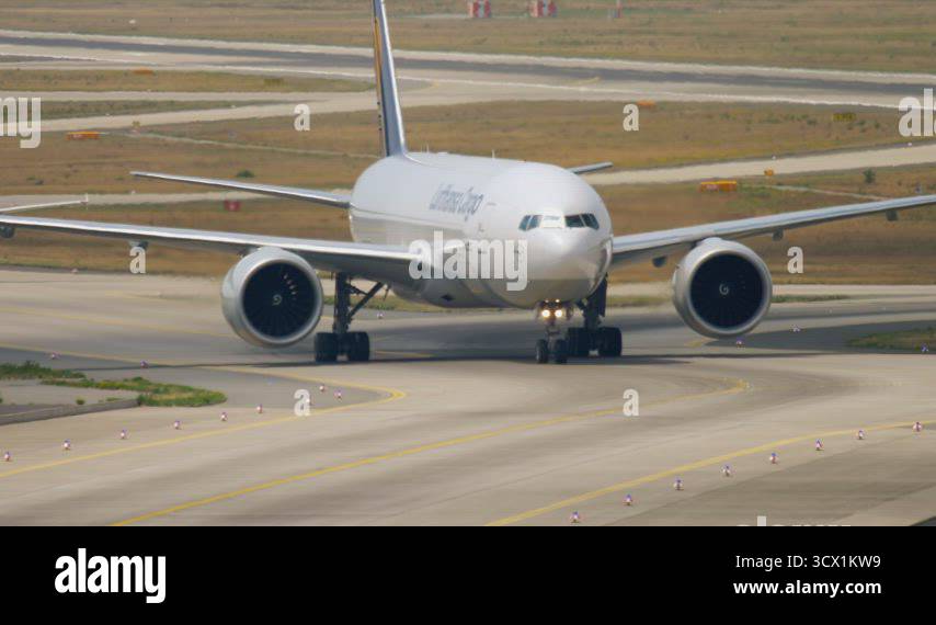 Boeing 777 taxiing after landing Stock Video Footage - Alamy