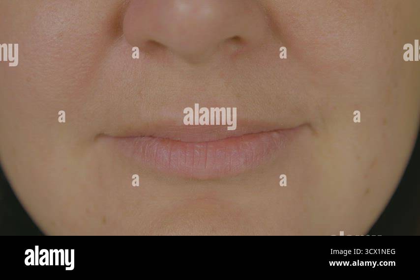 Female face showing kiss lips and smiling close up. Expression facial ...