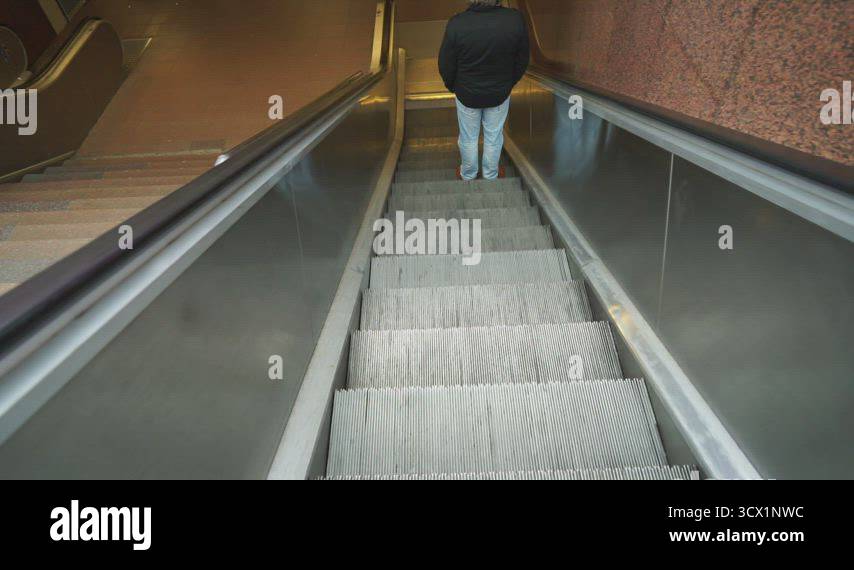 Escalator in a multi-storey car park near a large department store ...