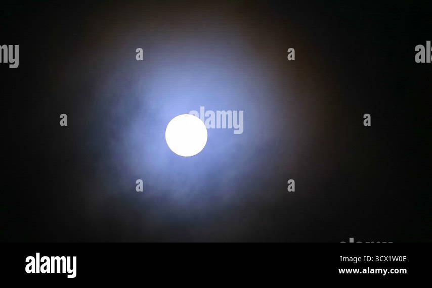 full harvest moon rise on night sky and dark cloud moving pass Stock ...