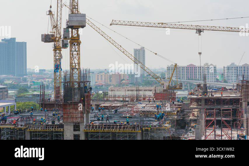 Aerial view timelapse of construction site busy operate in beginning of building new complex ...