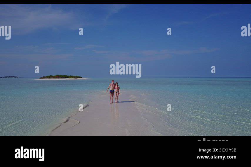 Romantic lady and man married on vacation have fun on beach on paradise ...