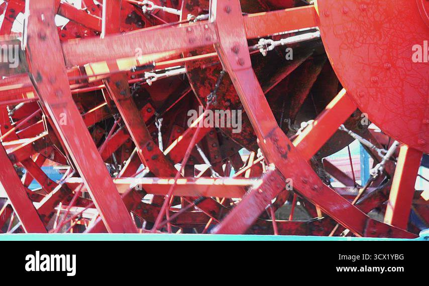 Red wooden paddle wheel of a paddle wheel steamer in motion Stock Video ...