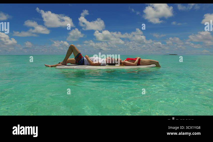 Happy people in love dating on vacation have fun on beach on summer ...