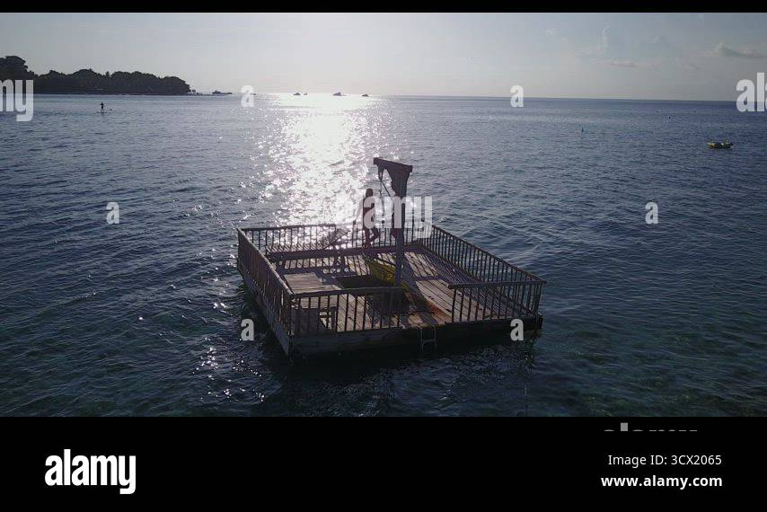 Beautiful people on honeymoon vacation enjoy luxury on beach on sunny ...