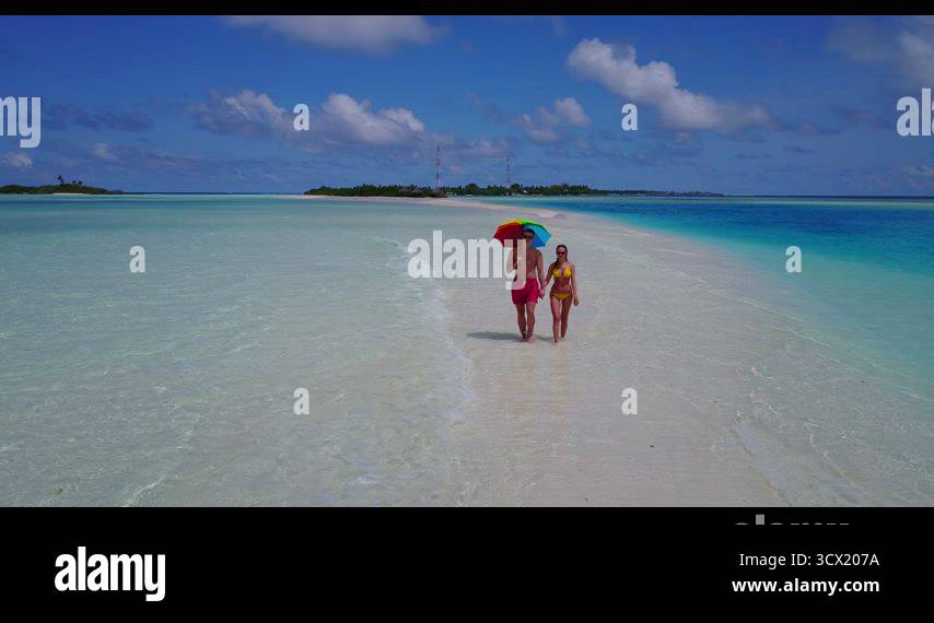 Beautiful man and woman on romantic honeymoon spend quality time on ...