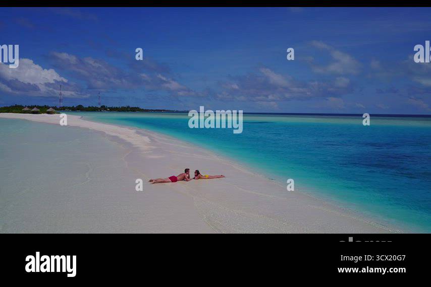 Beautiful couple in love dating on vacation spend quality time on beach ...