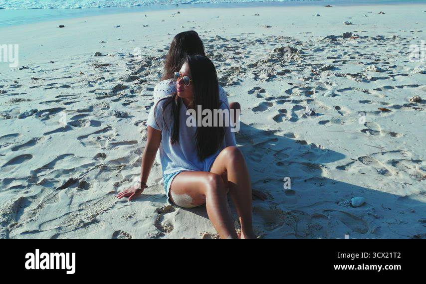 Young beauty models on vacation by the sea at the beach on summer white ...