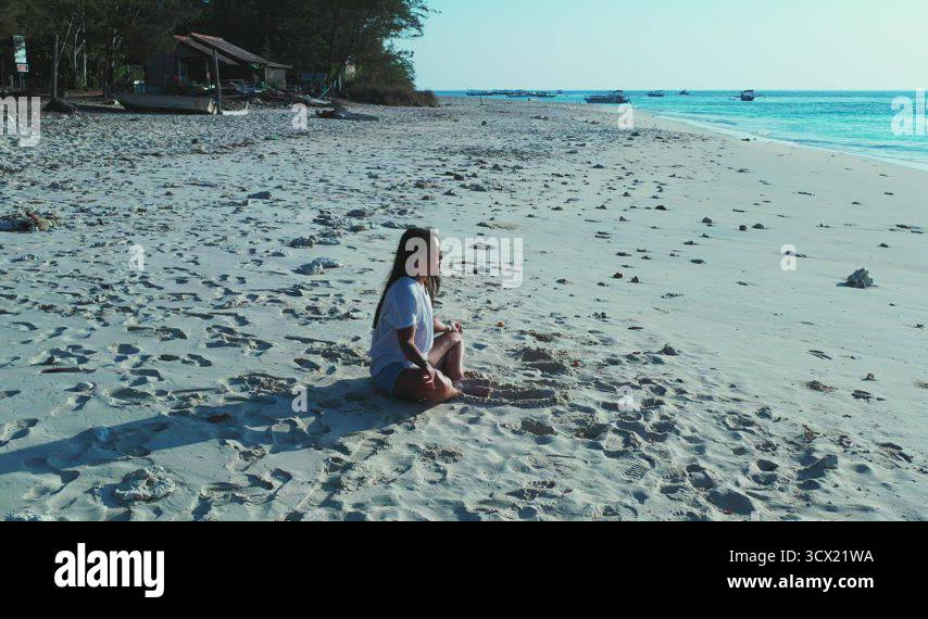 Pretty fun women on holiday in the sun on beach on sunny blue and white ...