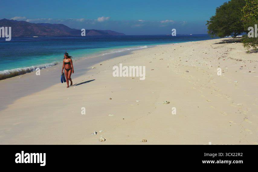 Beautiful beauty models on holiday spending quality time at the beach ...