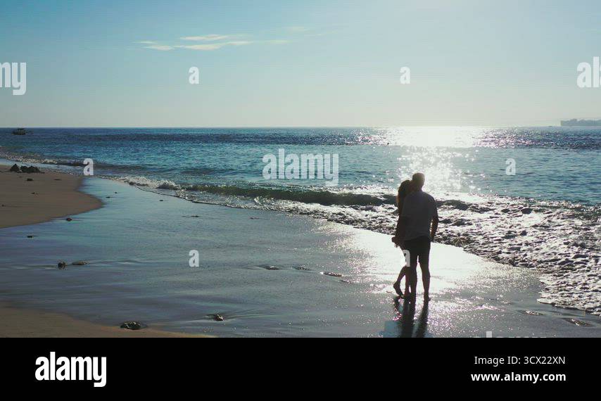 Happy people married on vacation live the dream on beach on white sand ...