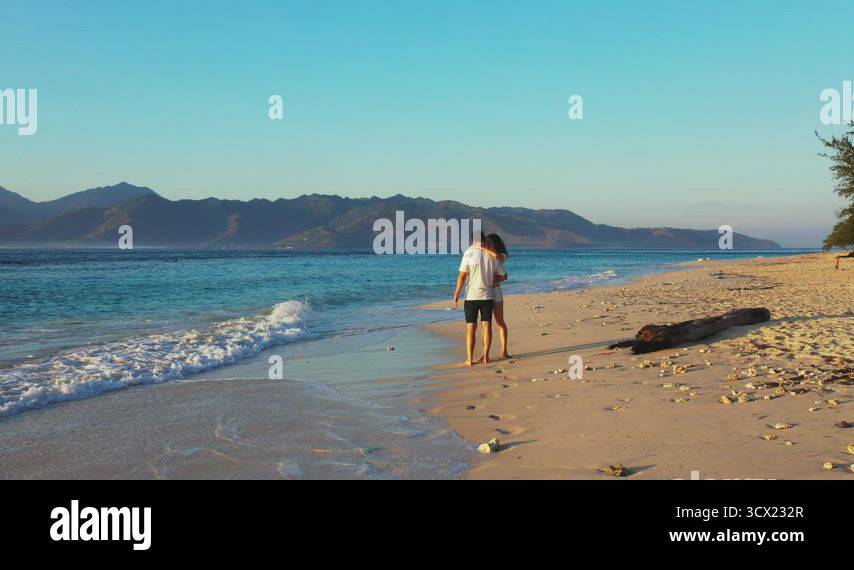 Romantic lady and man married on vacation enjoy luxury on beach on ...