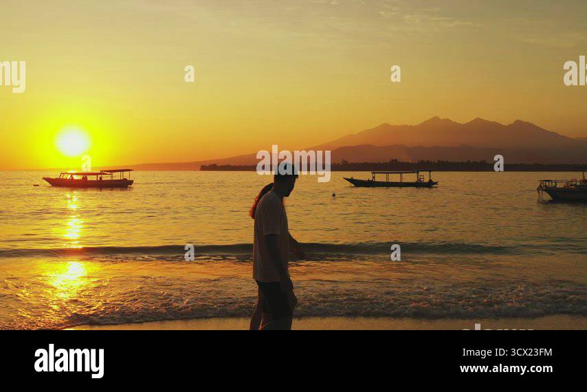 Happy boy and girl married on vacation have fun on beach on paradise white sand background 4K ...