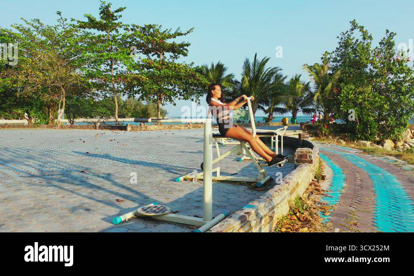 Young happy ladies on vacation enjoying life at the beach on sunny blue ...