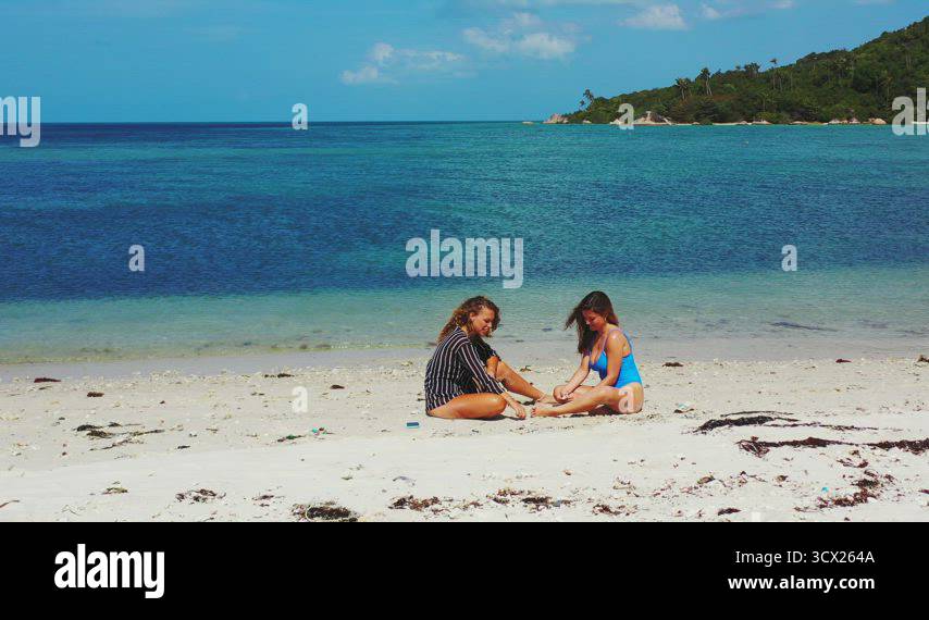 Young beauty models on vacation by the sea at the beach on summer white ...