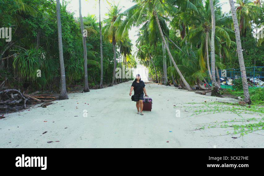 Modern happy lady on vacation having fun at the beach on summer white ...