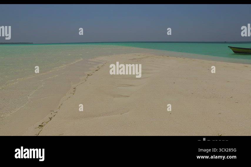 Wide angle overhead island view of a white sandy paradise beach and ...