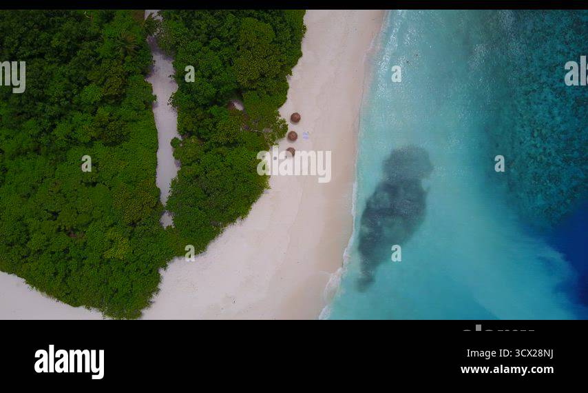 Wide angle drone abstract view of a white sand paradise beach and ...