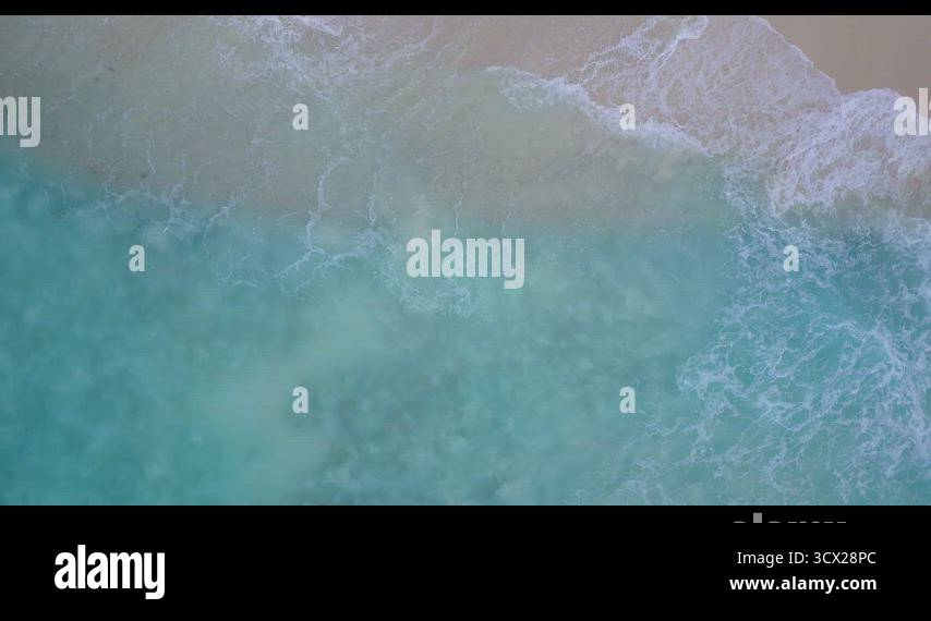 Wide overhead copy space shot of a white paradise beach and blue water ...