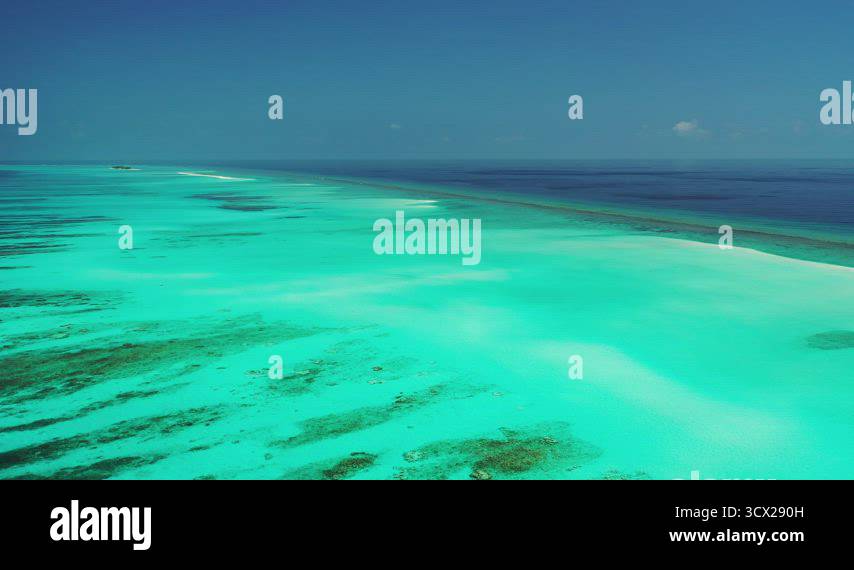 Beautiful above tourism shot of a white sandy paradise beach and blue ...