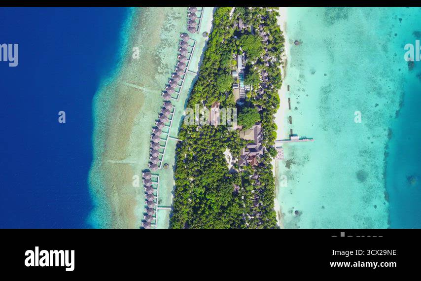 Wide angle overhead island view of a paradise sunny white sand beach ...