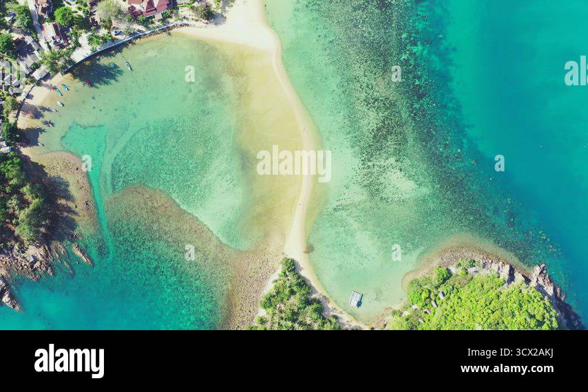 Tropical overhead island view of a white sandy paradise beach and blue ...
