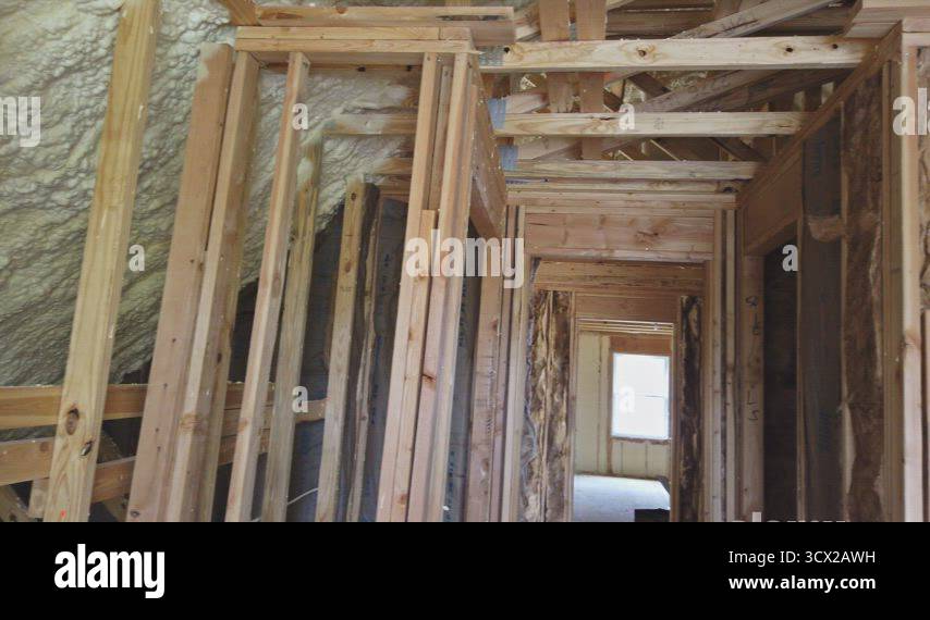 Thermal insulation in process of attic construction frame house a newly ...