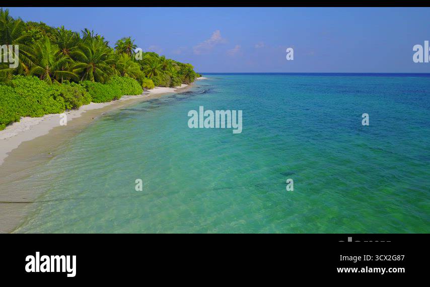Beautiful overhead travel shot of a paradise sunny white sand beach and ...