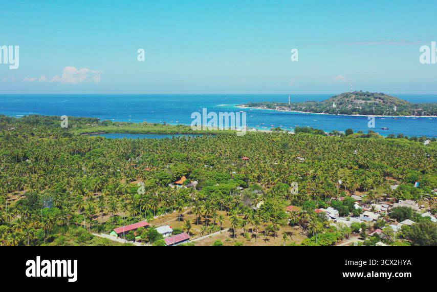 Wide angle drone abstract view of a sandy white paradise beach and blue ...