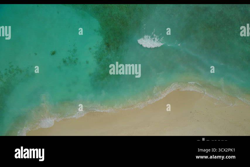 Luxury drone clean view of a paradise sunny white sand beach and aqua ...
