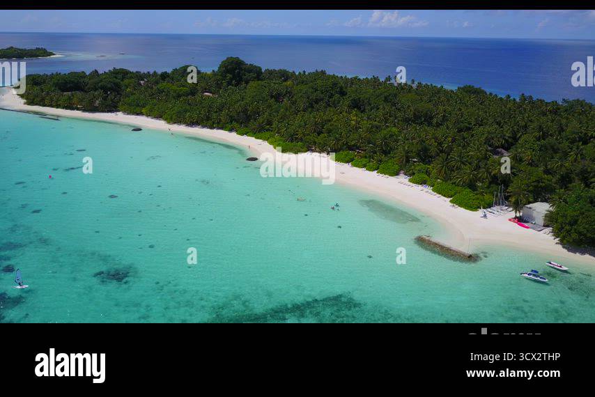 Tropical drone travel shot of a sandy white paradise beach and blue sea ...