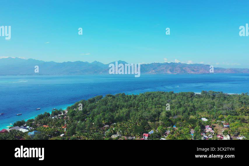 Wide angle drone abstract view of a white sandy paradise beach and blue ...