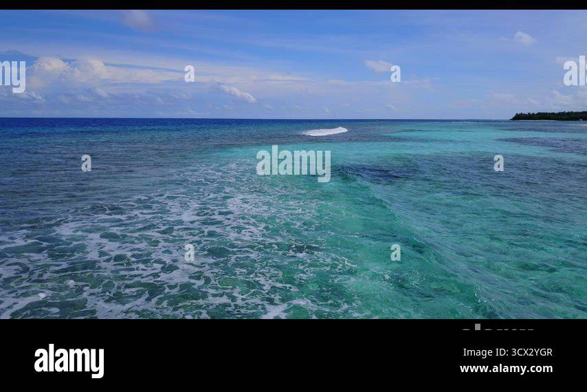 Wide angle drone clean view of a white sand paradise beach and aqua ...