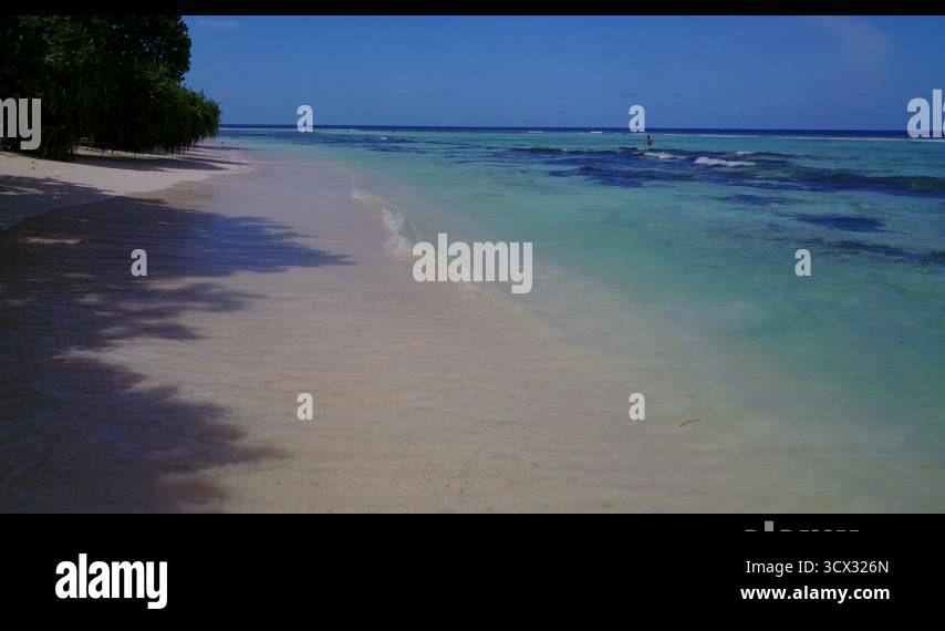 Beautiful aerial tourism shot of a summer white paradise sand beach and ...