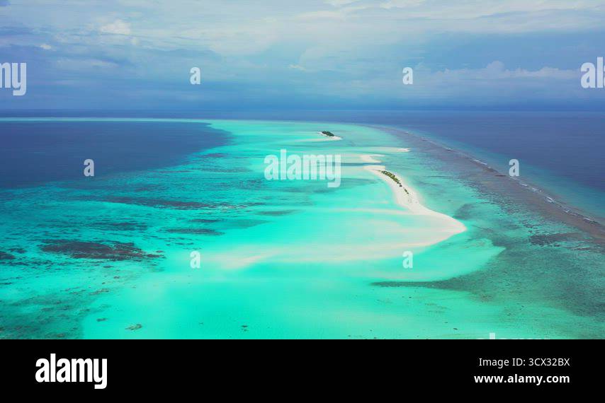 Wide overhead abstract shot of a sunshine white sandy paradise beach ...