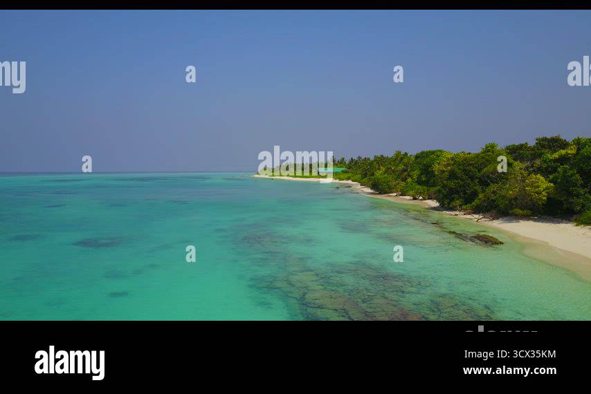 Wide drone clean view of a sandy white paradise beach and turquoise sea ...
