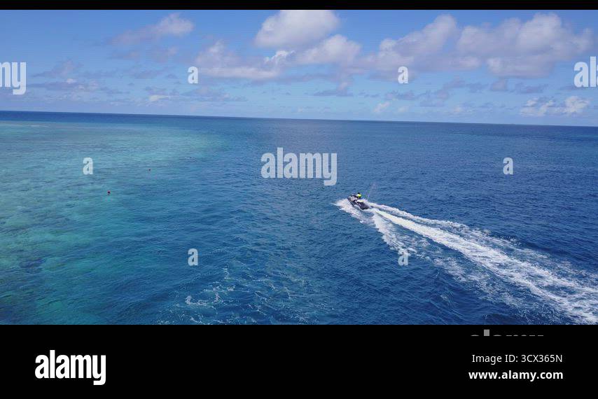 Daytime aerial travel shot of a summer white paradise sand beach and ...