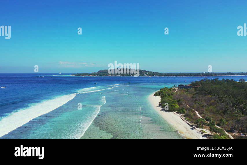 Wide angle aerial abstract view of a white paradise beach and aqua blue ...