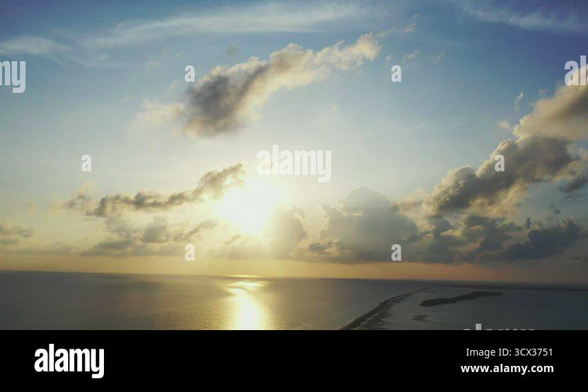 Natural above island view of a paradise sunny white sand beach and blue ...