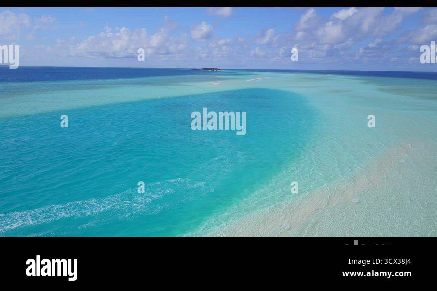 Tropical drone clean view of a paradise sunny white sand beach and blue ...