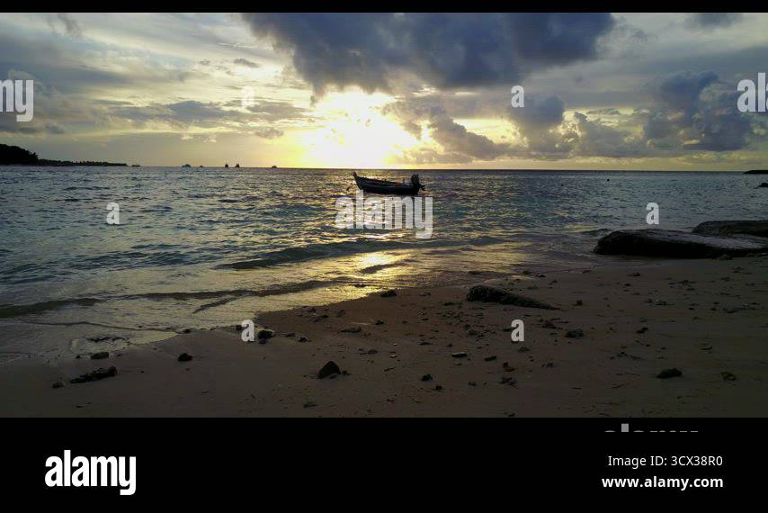 Luxury flying clean view of a sandy white paradise beach and blue water ...