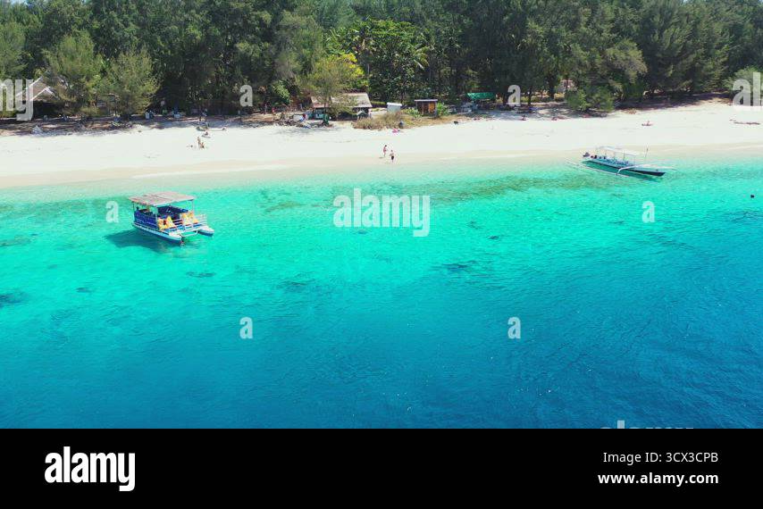 Beautiful overhead island view of a sunshine white sandy paradise beach ...