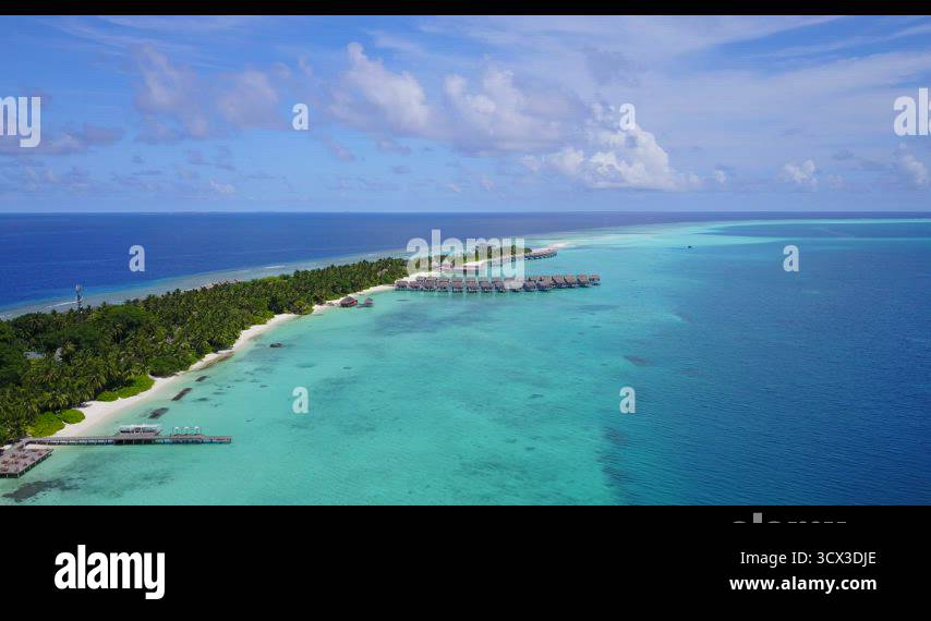 Wide drone clean view of a sandy white paradise beach and aqua ...